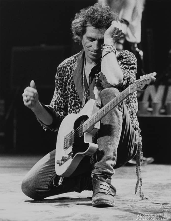 Keith Richards of The Rolling Stones kneeling on stage at The Beacon ...